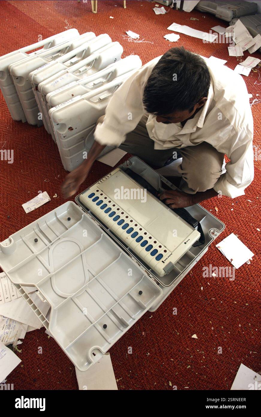 Worker packing electronic voting machine evm in Bombay Mumbai ...