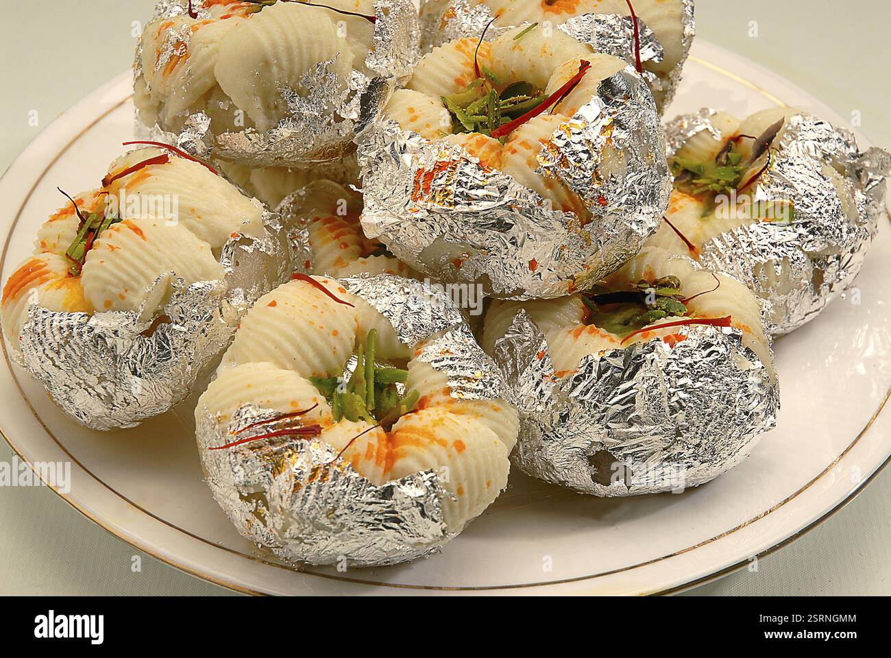 Sweet, kharbuja pista barfi in plate, Jodhpur, Rajasthan, India, Asia ...