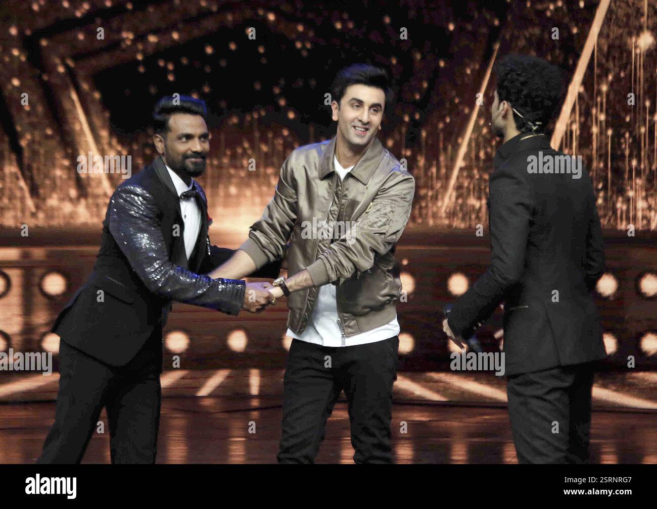 Bollywood actor Ranbir Kapoor with choreographer Remo D'Souza during the grand finale of Dance ...