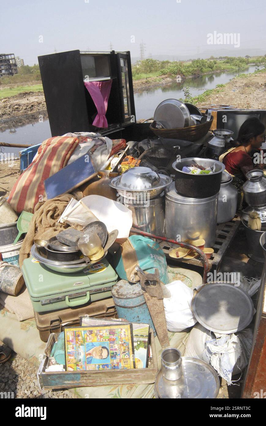 Slum dweller belongings demolish illegal slums at Bhandup in Bombay ...