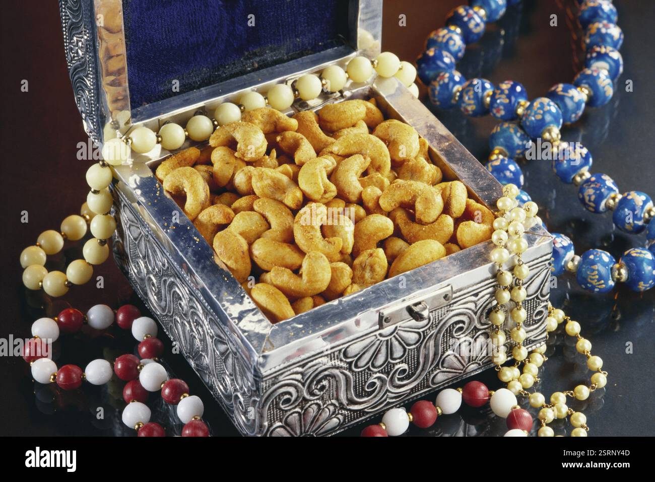 Masala flavoured cashew nuts, India, Asia Stock Photo - Alamy