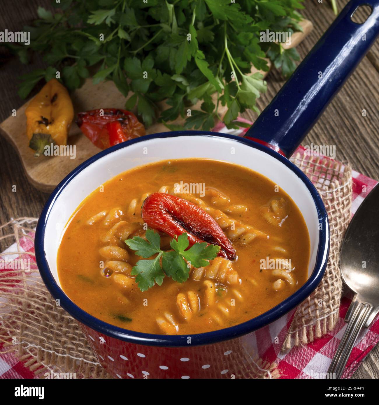 Pepper soup also full grain noodles Stock Photo - Alamy
