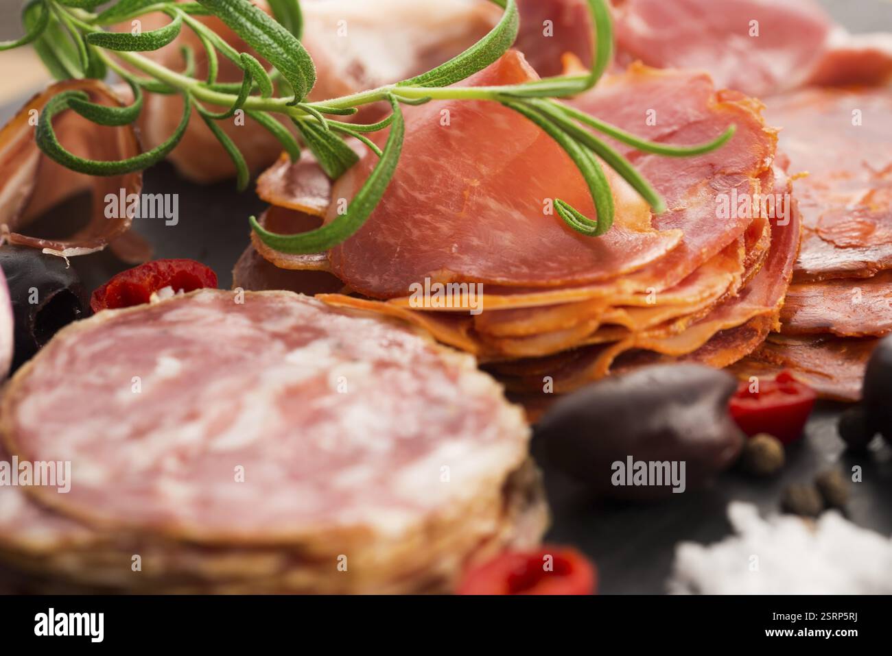 A pile of different spanish embutido, jamon, chorizo and lomo embuchado ...