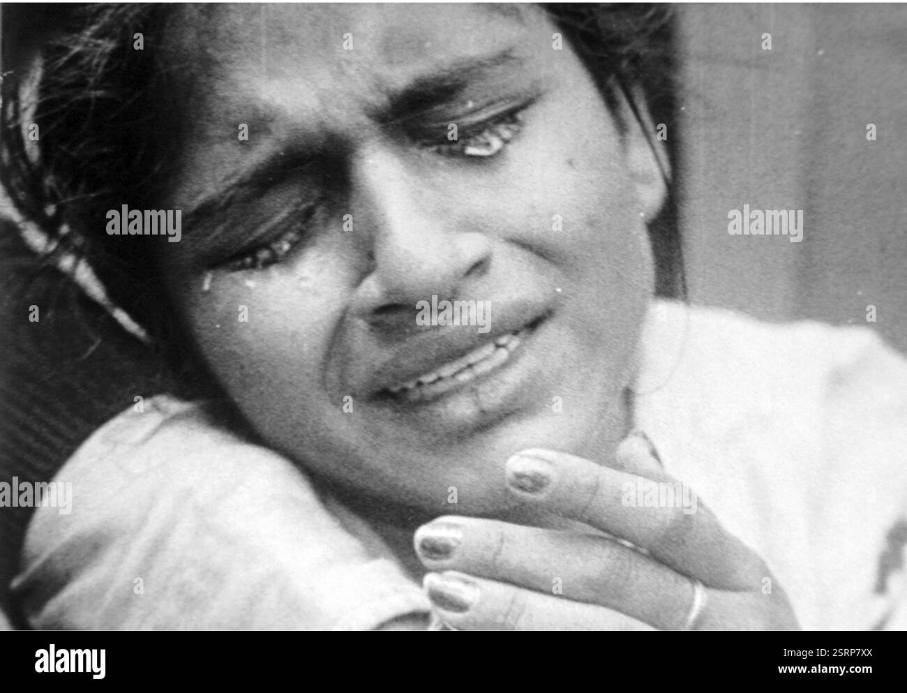 Indian women crying Black and White Stock Photos & Images - Alamy