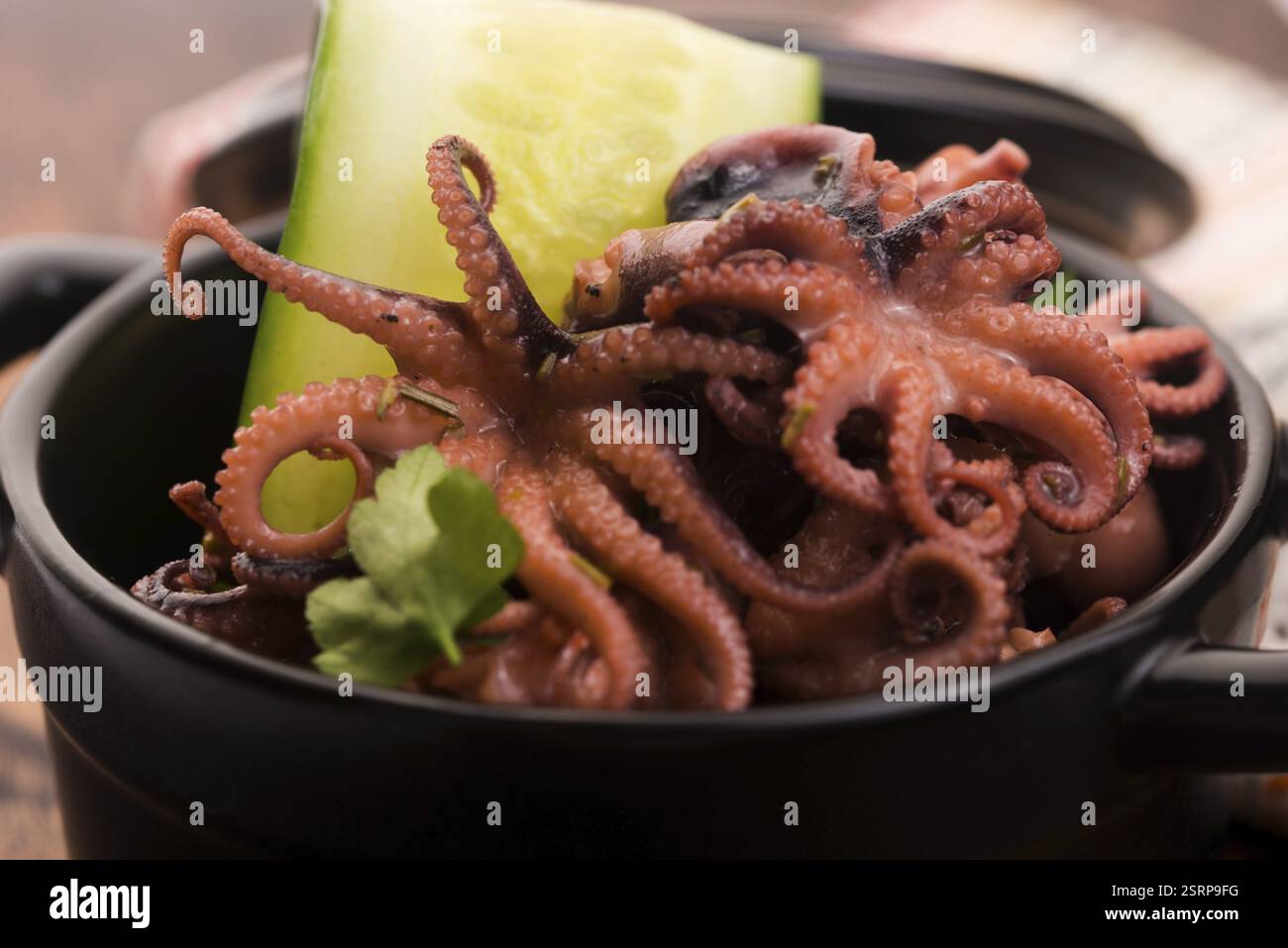 Octopus. Greek, eating Stock Photo - Alamy