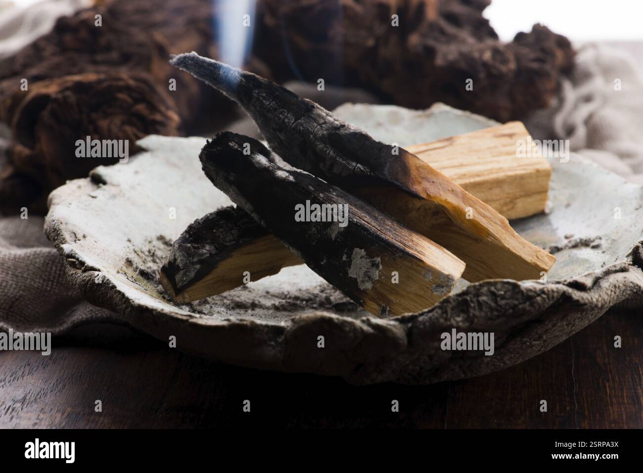 Smudging ceremony using Peruvian Palo Santo holy wood incense stick ...
