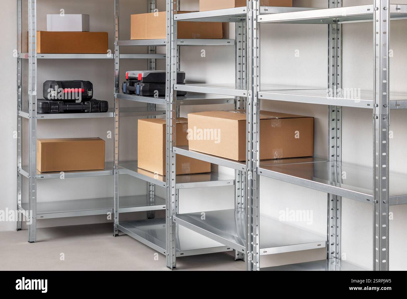 Metal warehouse shelves filled with different sizes of beige cardboard ...