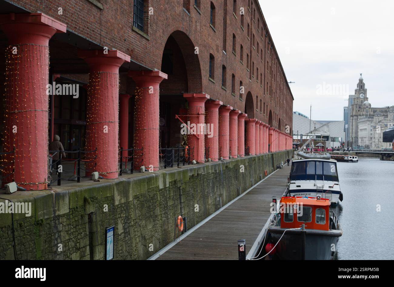 Royal Albert Dock in Liverpool with boats tied up in the water. The ...