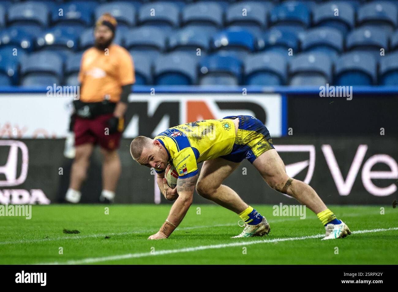 Matt Dufty of Warrington Wolves goes over for a try during the Betfred ...
