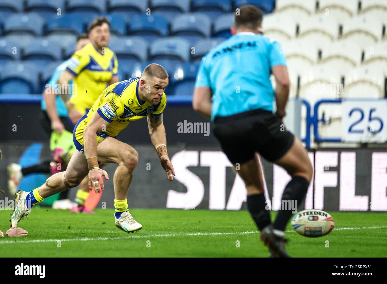 Matt Dufty of Warrington Wolves goes over for a try during the Betfred ...