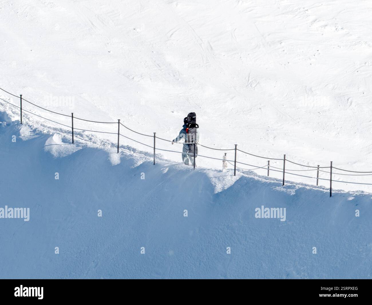 Chamonix-Mont-Blanc, France, January 21, 2025. A paragliding man with a ...