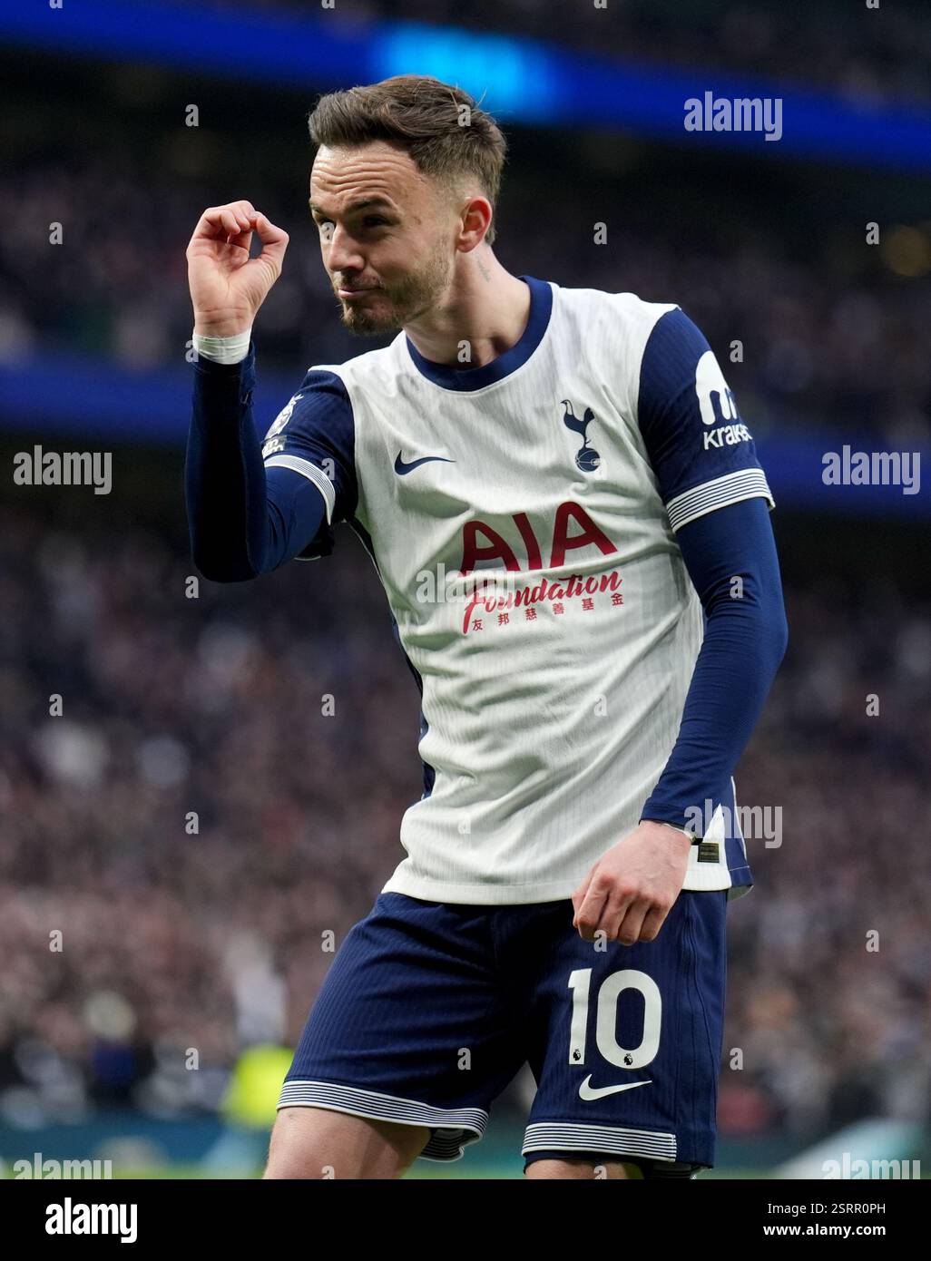Tottenham Hotspur's James Maddison celebrates scoring the opening goal ...