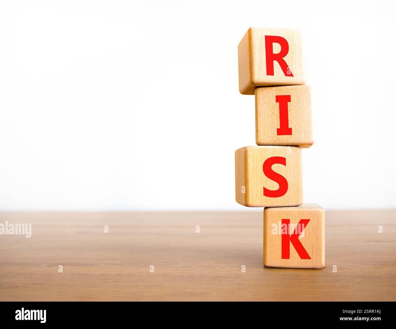 Risk symbol. Concept word Risk on beautiful wooden blocks. Beautiful ...