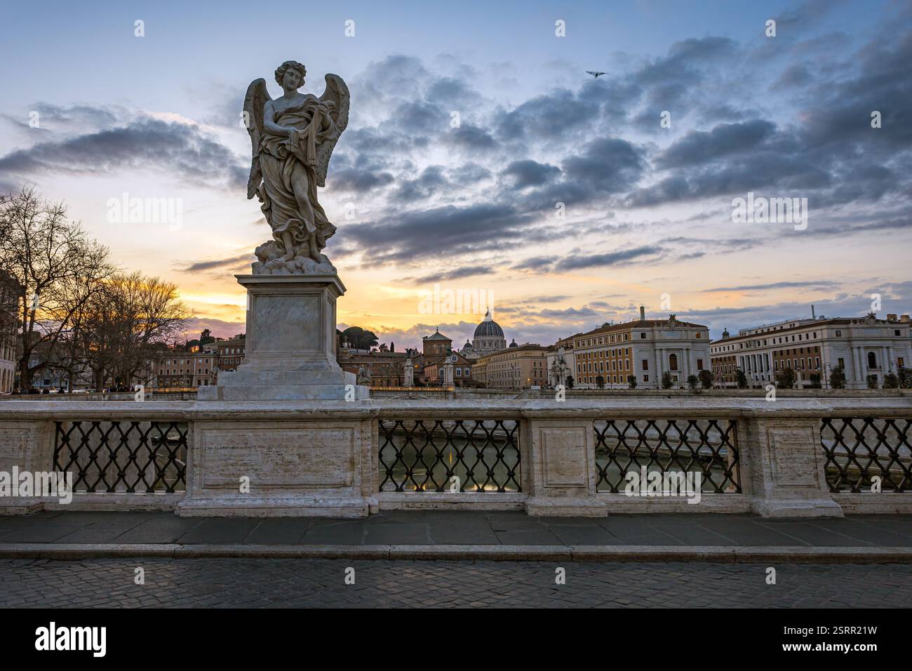 Angel statue decorating the Saint Angelo bridge over the Tiber River ...