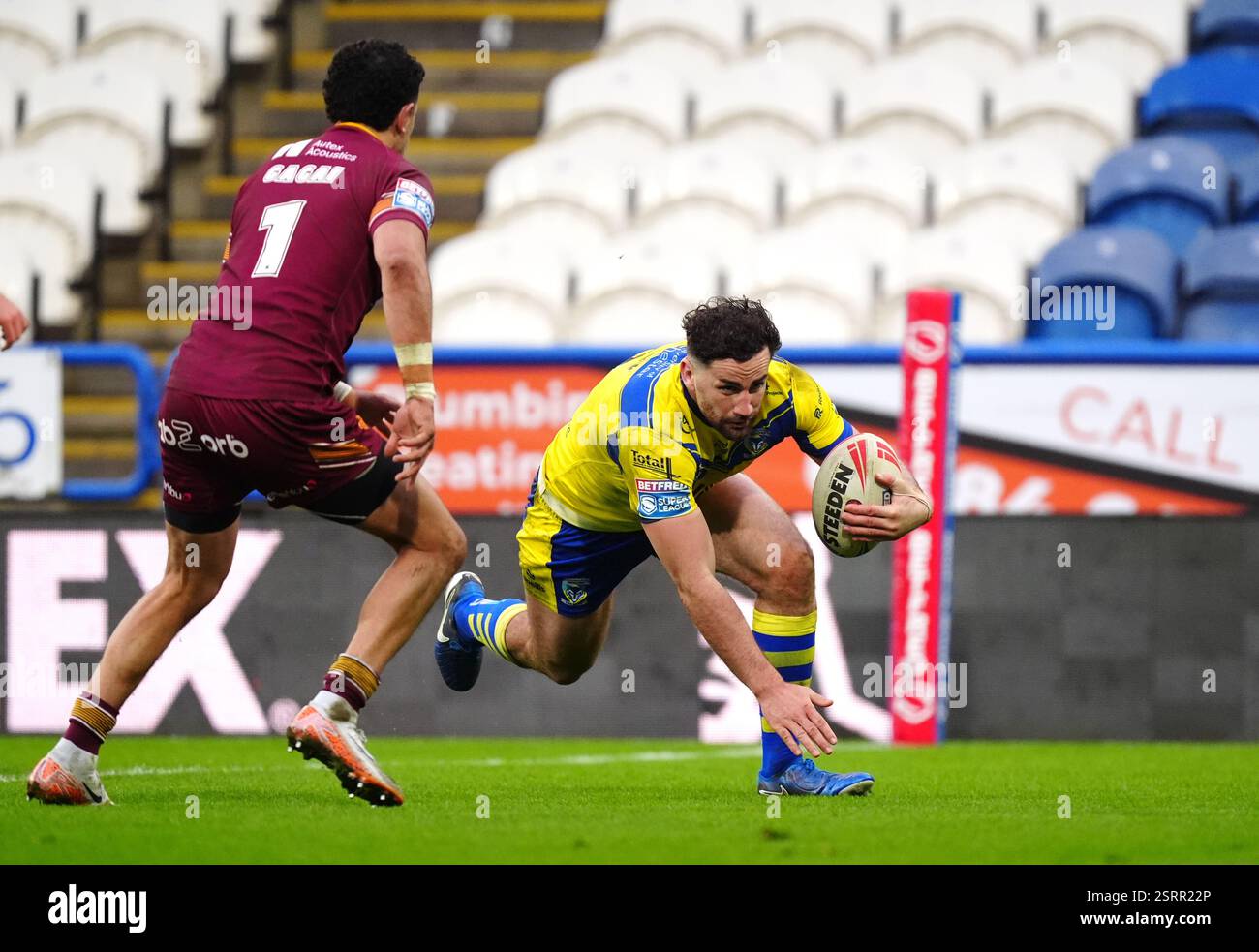Warrington Wolves' Toby King scores their side's third try of the game ...