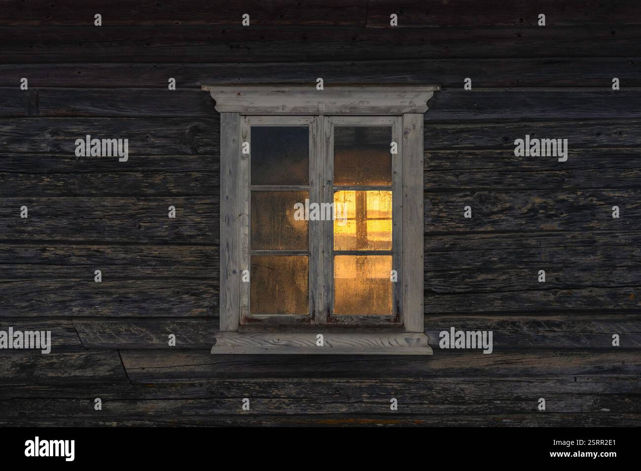 Windows of an old log house in the cultural landscape between Bilitt ...