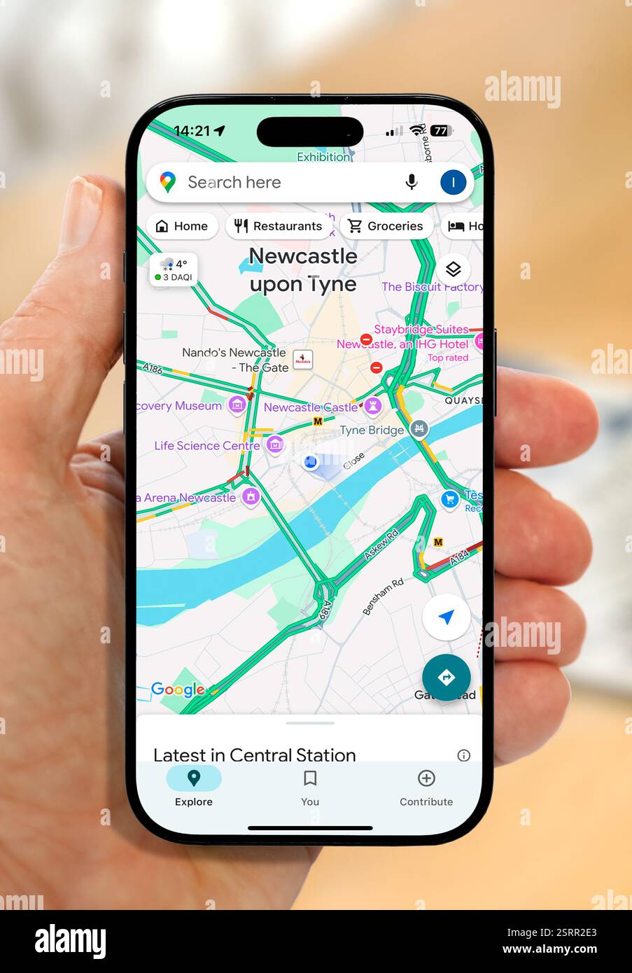 Looking at the Google Maps app on an iPhone 16 Plus Stock Photo - Alamy