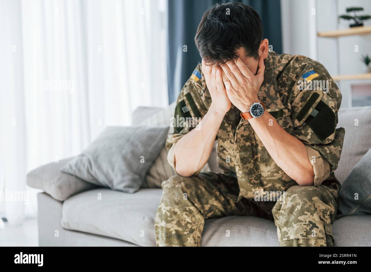 Having flashbacks. Post traumatic stress disorder. Soldier in uniform ...