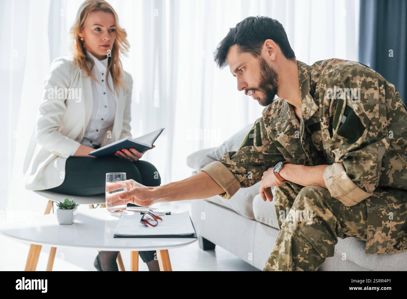 Process of recovery. Soldier have therapy session with psychologist ...