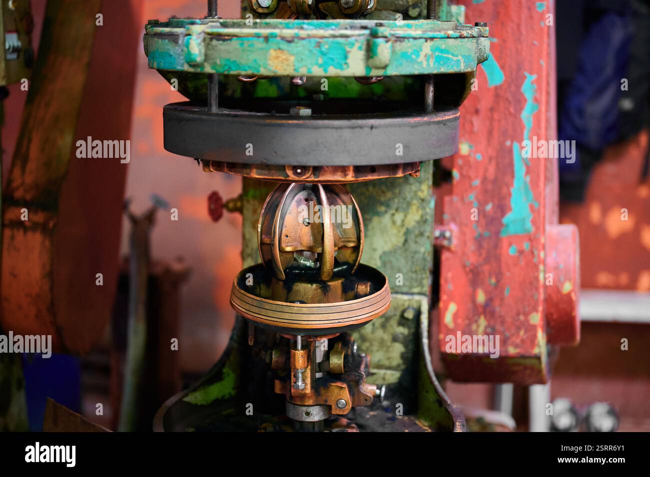 Intricate machinery for antique hat making showcases craftsmanship and ...