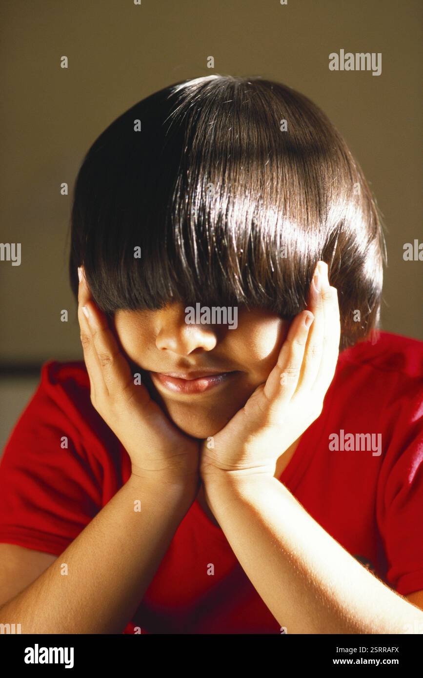 Girl hair hiding eyes kept both hands on cheeks MR#201 Stock Photo - Alamy