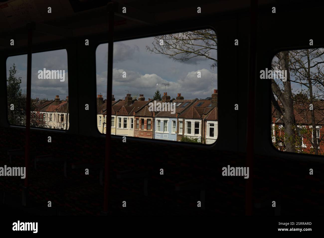 View from a London Overground train of terraced houses in a residential ...