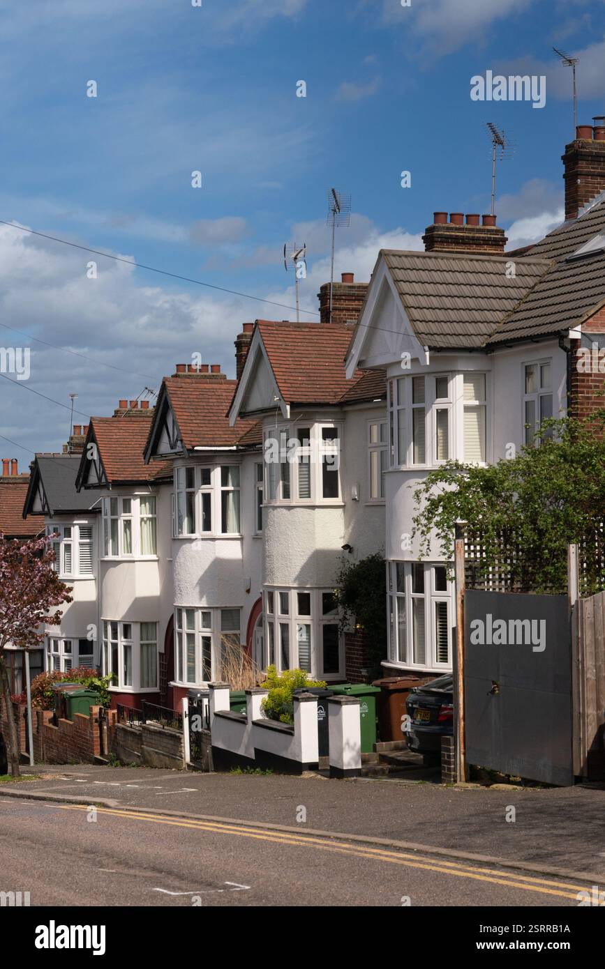 Row of typical UK terraced houses, Walthamstow London, on a sunny day ...