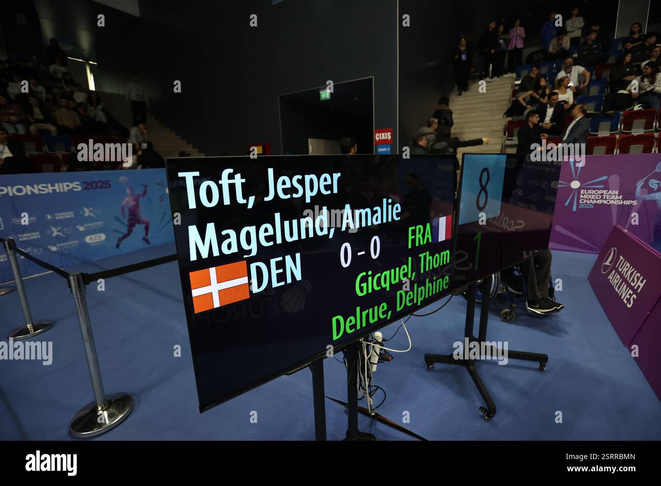 Amalie Magelund and Jesper Toft, behind, of Denmark compete against ...