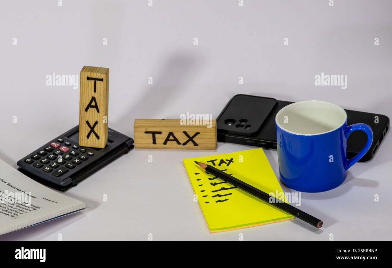 The image shows a collection of items typically associated with tax ...