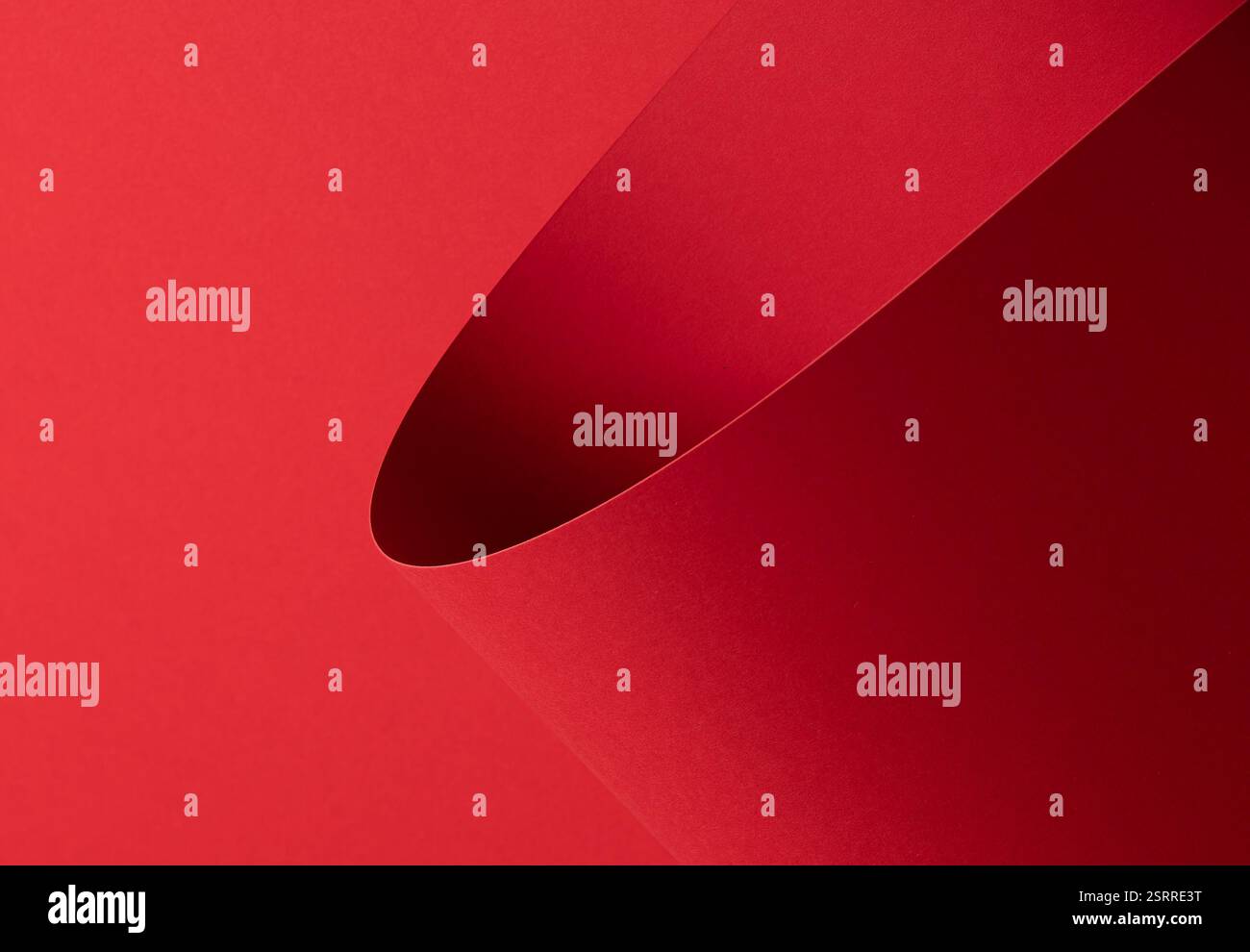 Bold scarlet red paper background with a deep matte texture and wavy ...