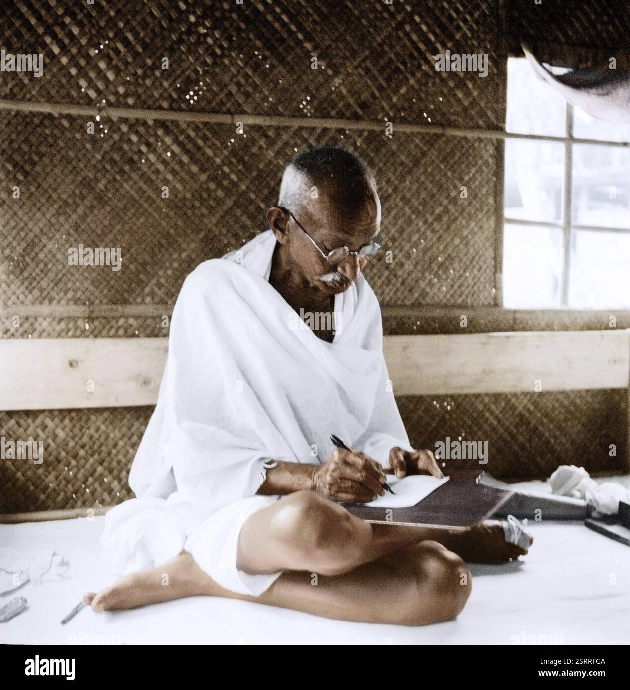 Mahatma Gandhi sitting and writing in his hut, Bangladesh, Asia ...