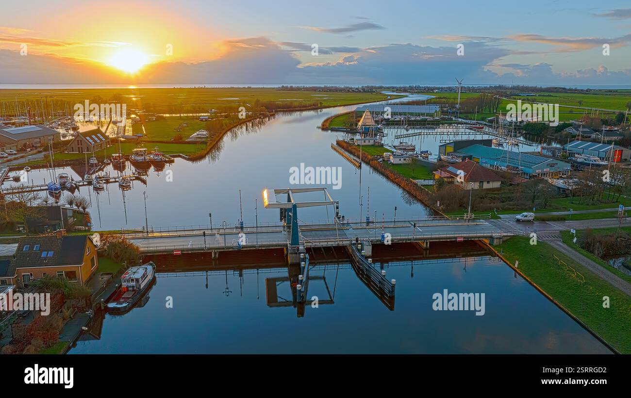 Beautiful sunset at the Johad Friso canal in Warns Friesland the ...