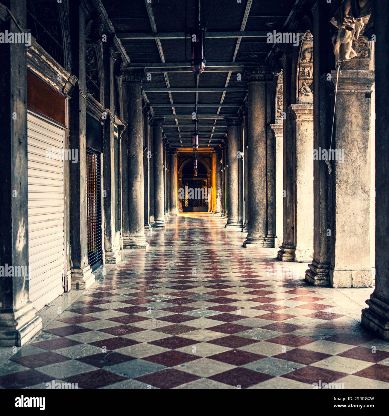 A beautifully captured historic arcade in Venice, Italy, featuring ...