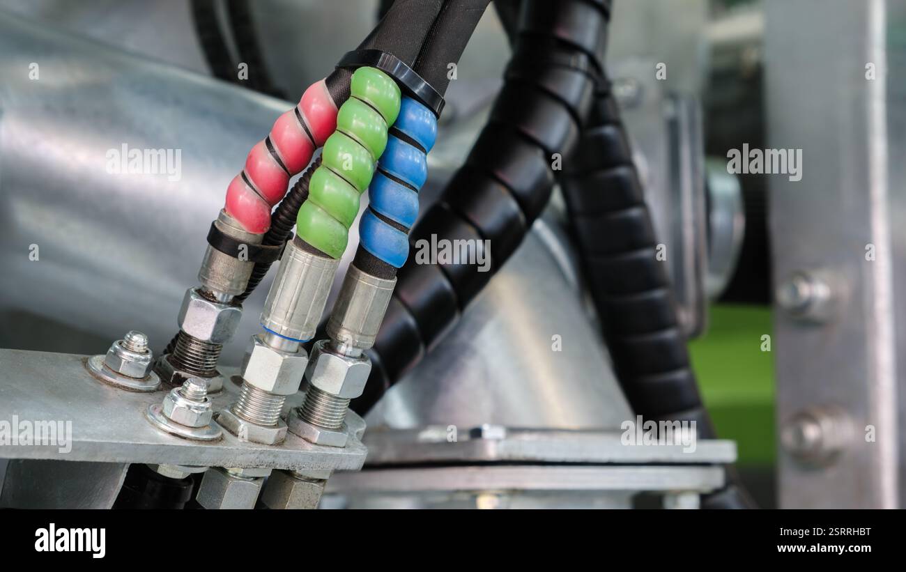 hydraulic drives of industrial high power machine, many pipes are ...