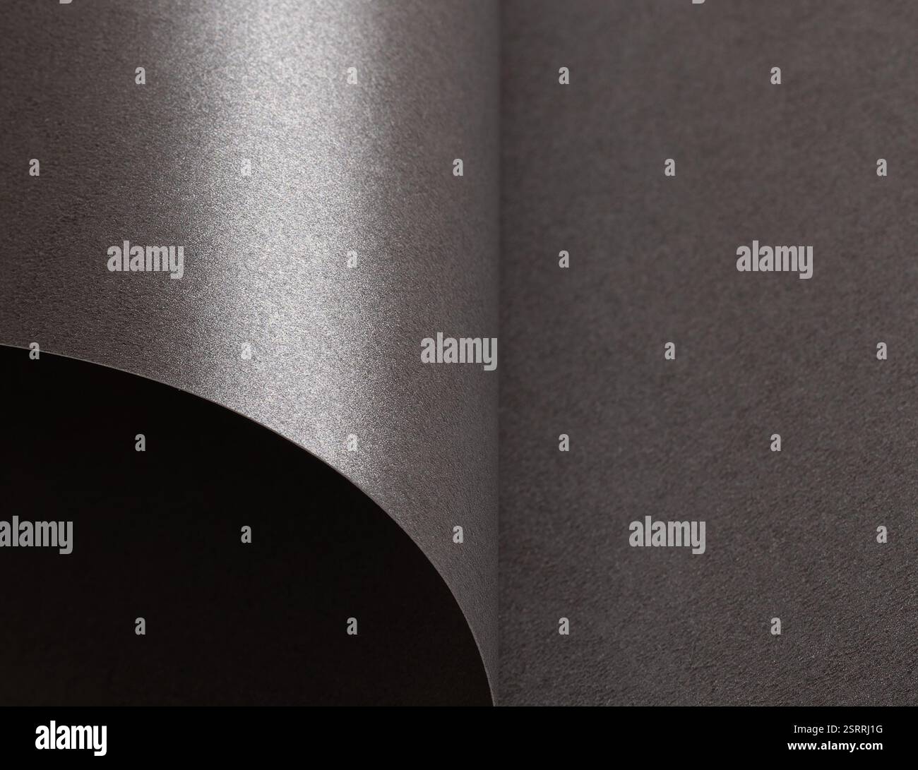 Charcoal gray paper background with a pearlescent, glossy texture and ...