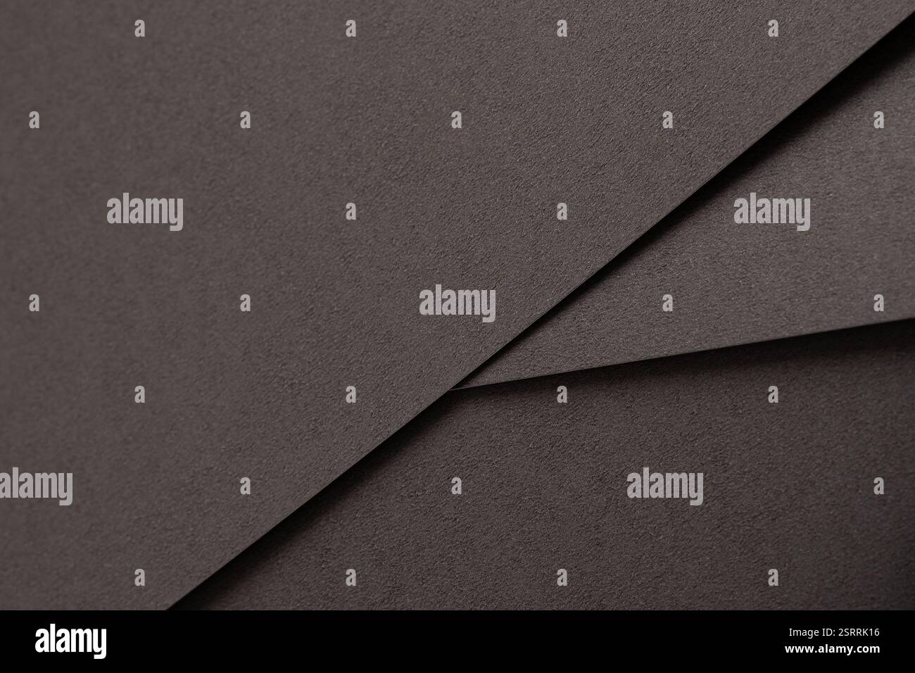 Dark espresso brown paper background with a smooth matte texture and ...