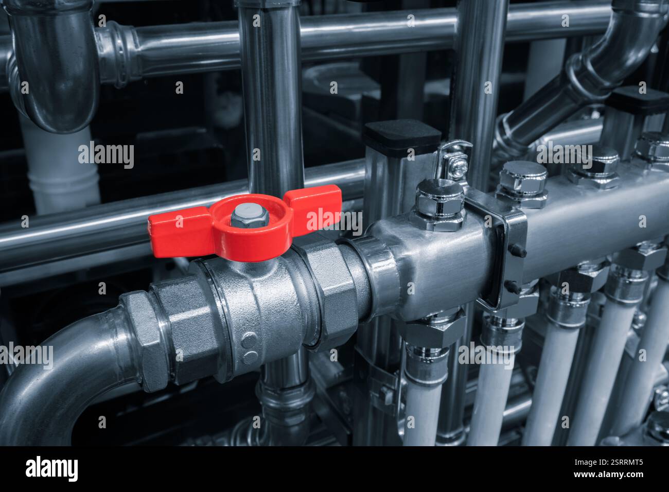 Water supply wiring in the boiler room, metal and plastic pipes ...