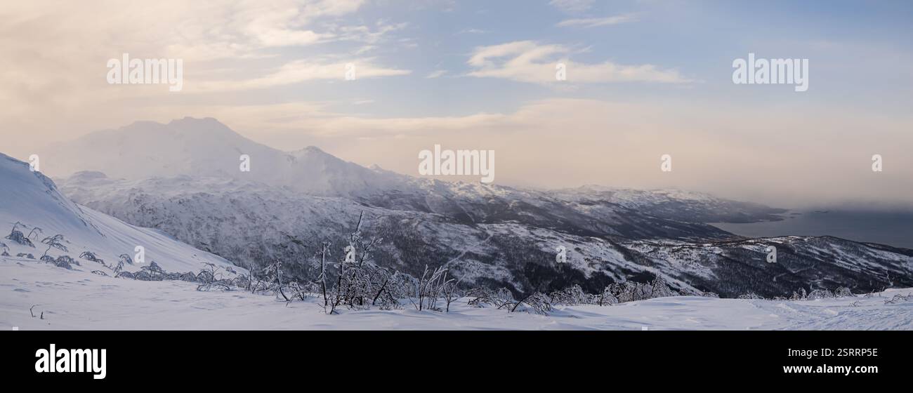 Panorama for peaks of snowy mountains seen from the top of ...