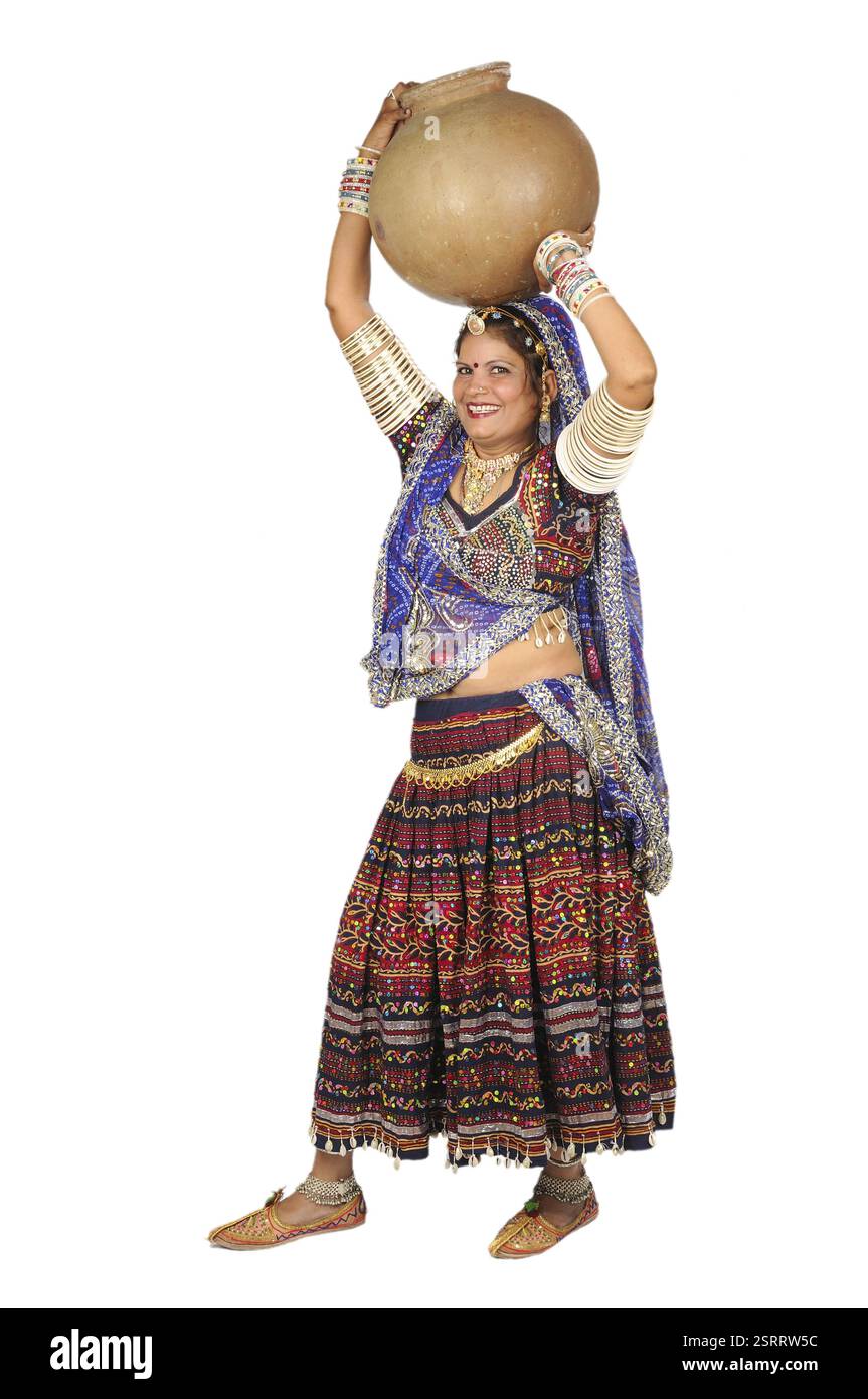 Rajasthani lady carrying earthen pitcher on head MR#786 Stock Photo - Alamy