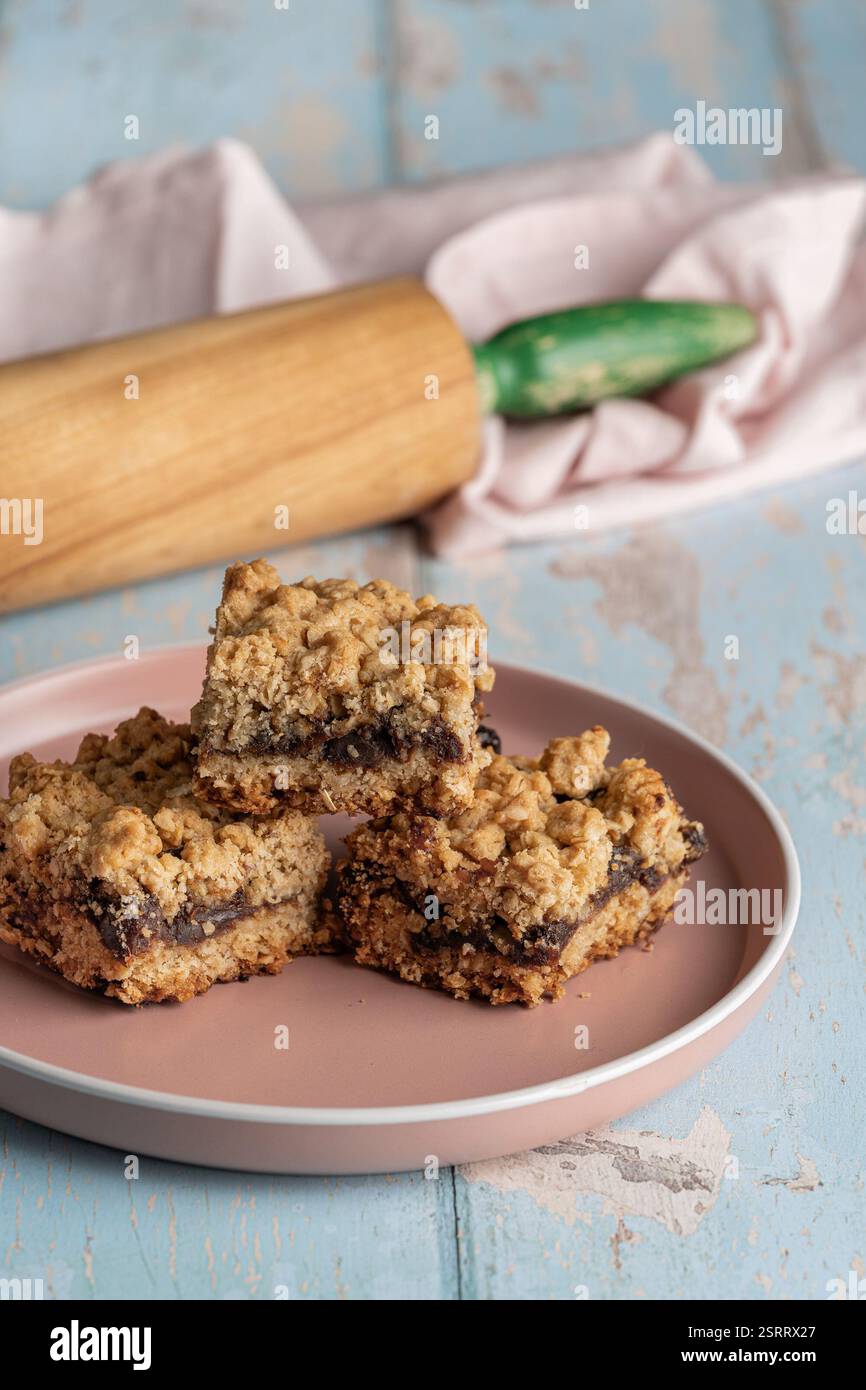Delicious oat and date squares, beautifully golden and crispy, served ...