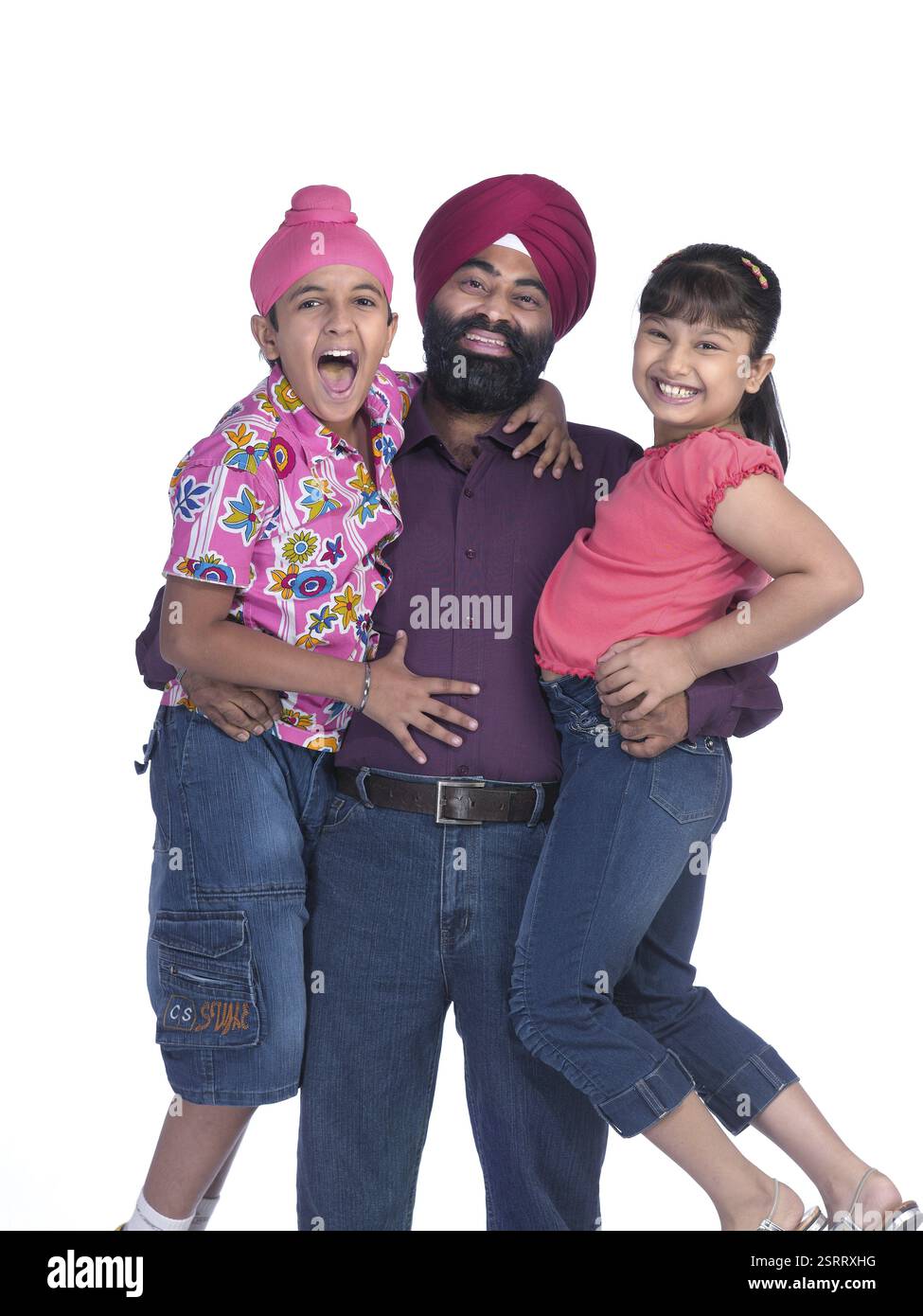 Sikh father carrying children in arms MR#702X, 702Y, 779A Stock Photo ...
