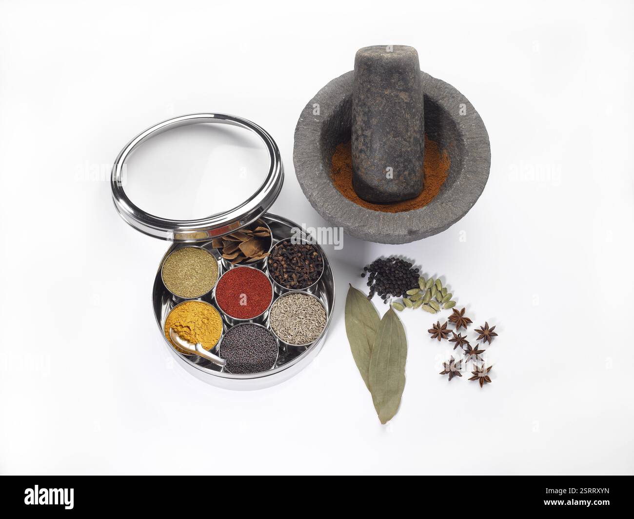 Different types of spices in bowls in stainless steel box with old ...