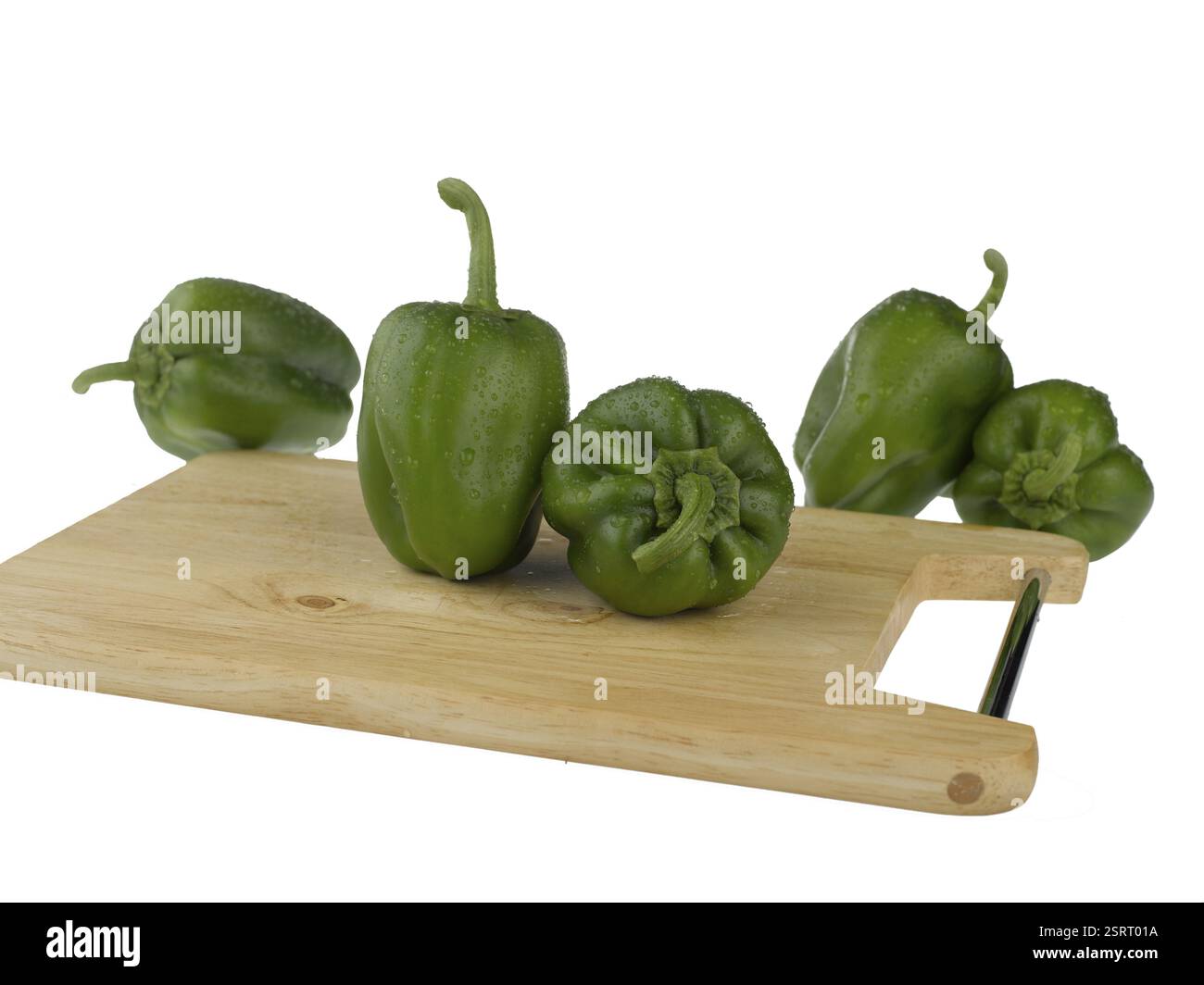 Vegetables, capsicum with cutting board on white background Stock Photo ...