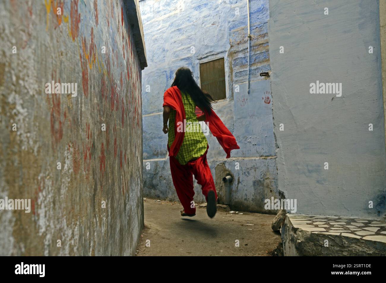 Indian woman running hi-res stock photography and images - Alamy