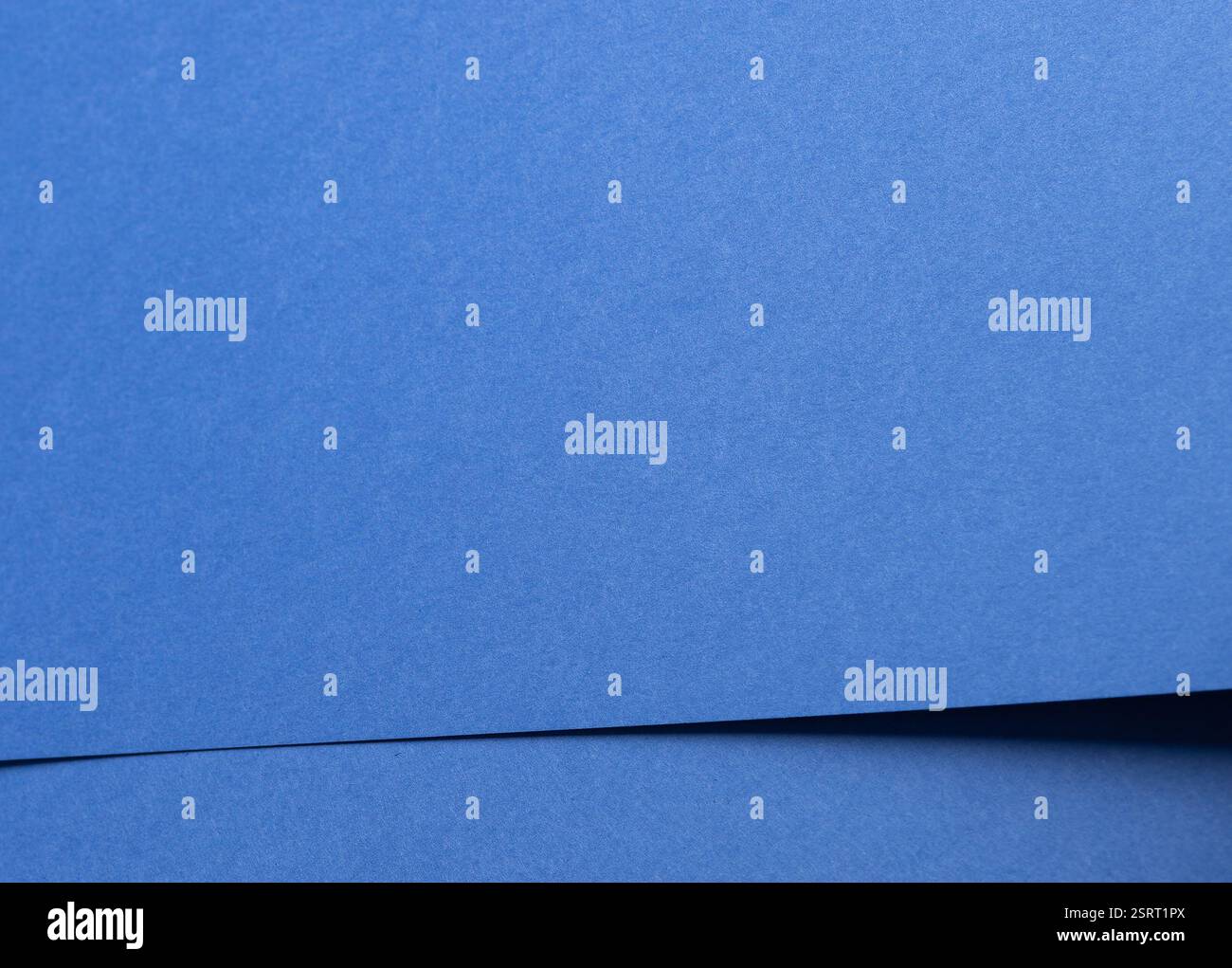Deep sapphire blue paper background with a smooth texture and ...