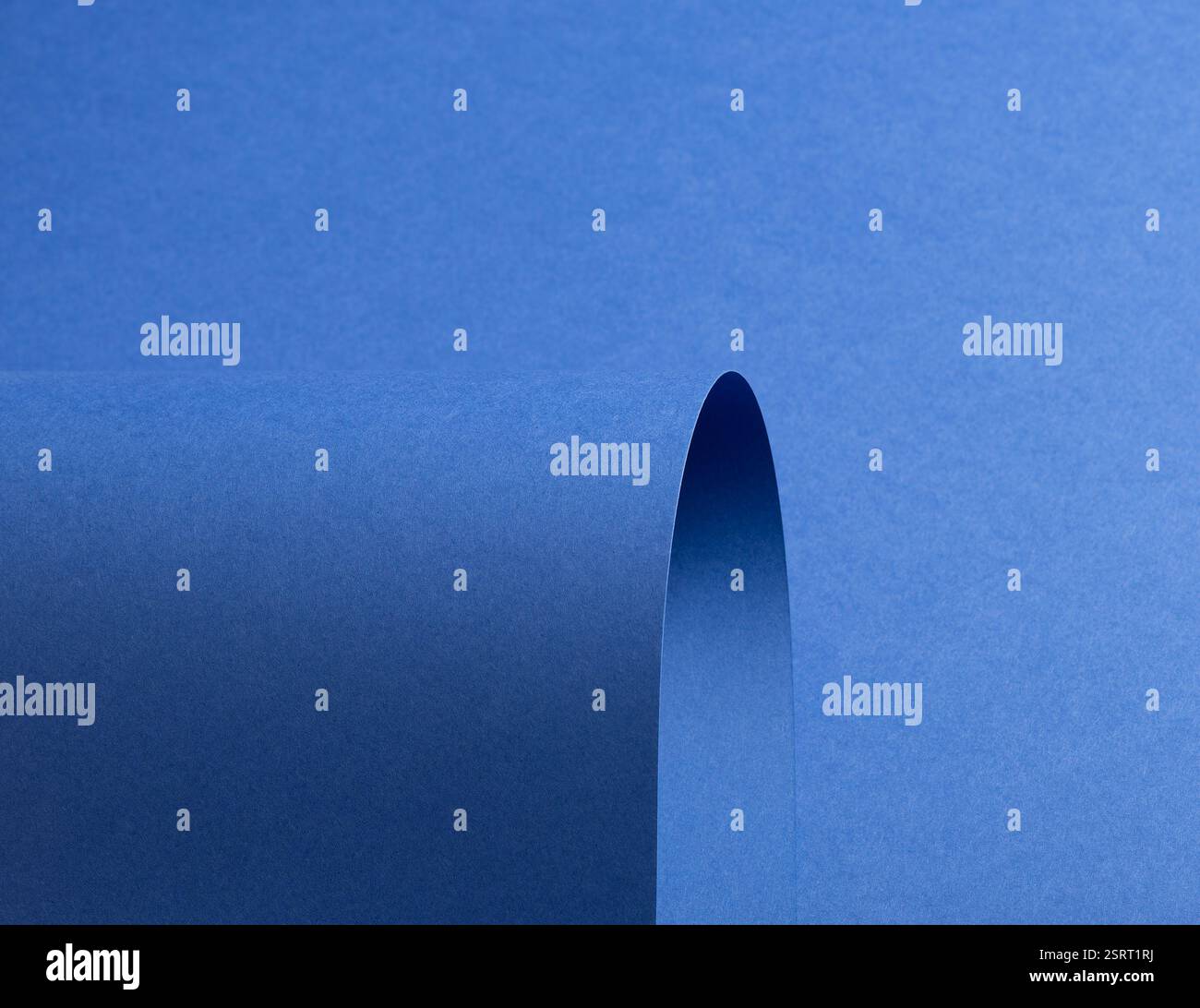 Deep sapphire blue paper background with a smooth texture and ...
