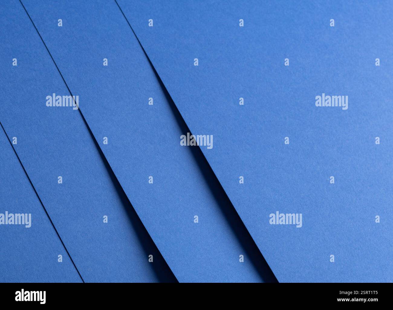 Deep sapphire blue paper background with a smooth texture and ...