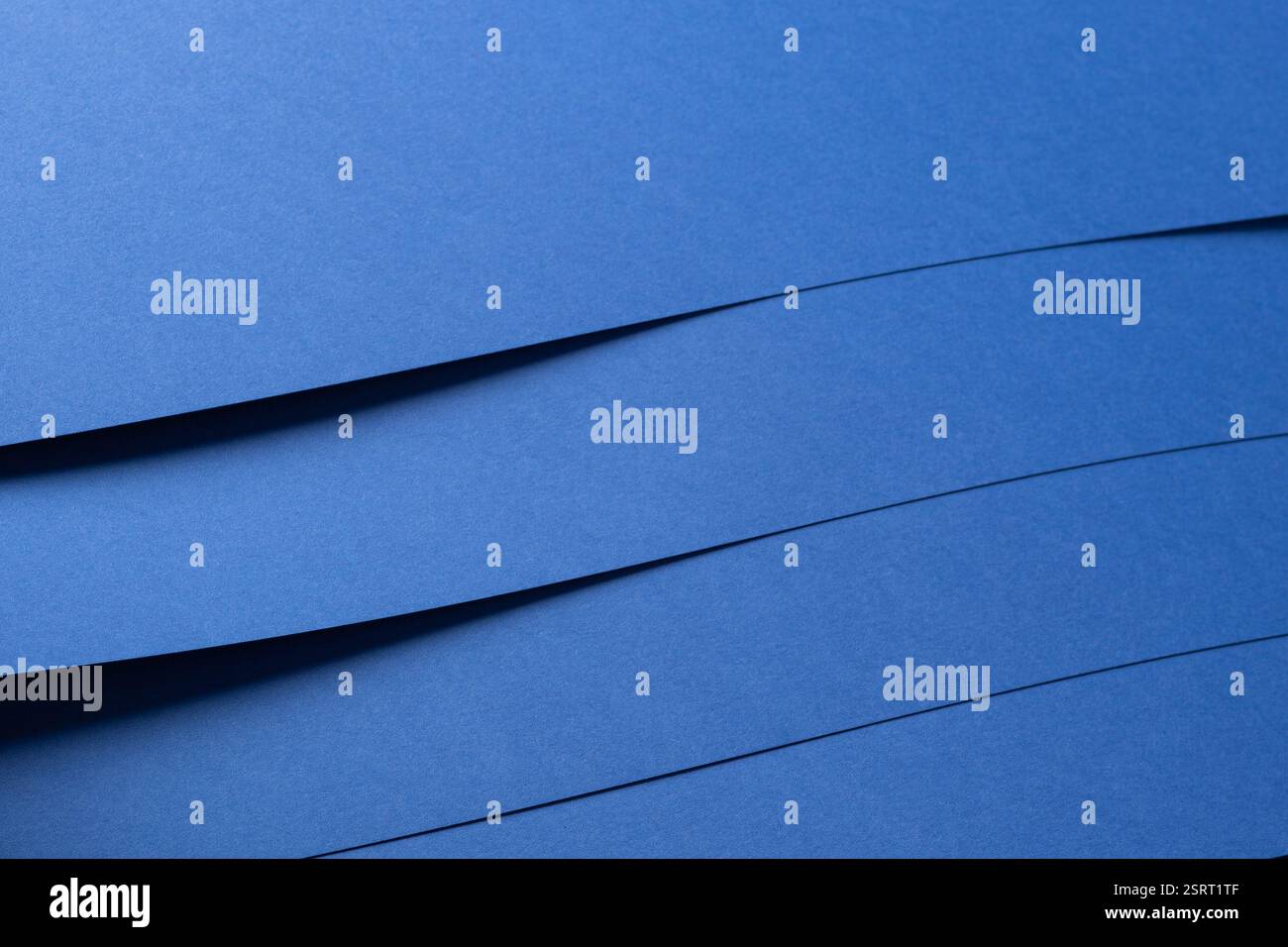 Deep sapphire blue paper background with a smooth texture and ...