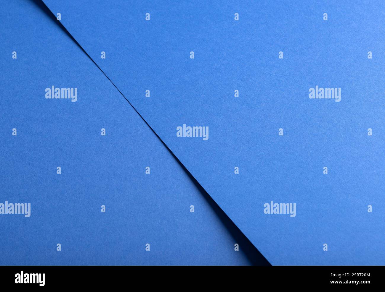 Deep sapphire blue paper background with a smooth texture and ...