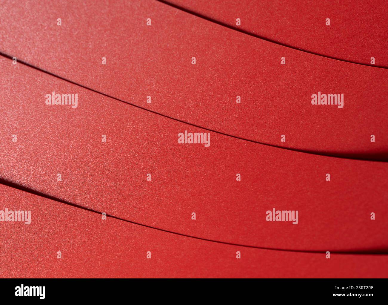 Fiery crimson paper background with a fine grainy texture and layered ...